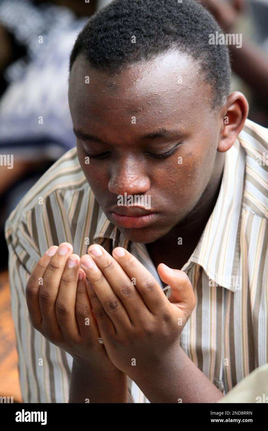 A Kenyan Muslim offers his prayers during the second Friday of the holy ...