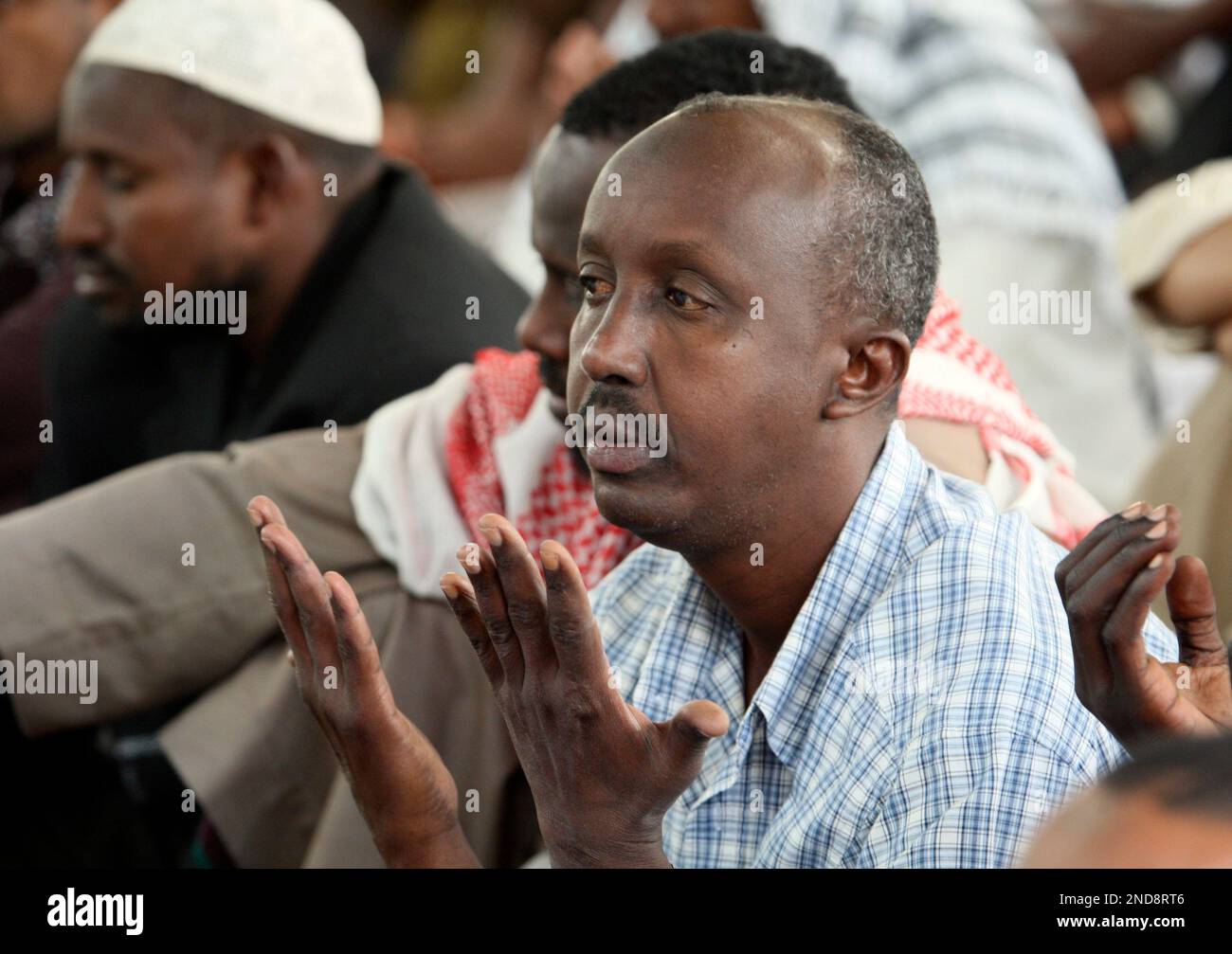 A Kenyan Muslim offers his prayers during the second Friday of the holy ...
