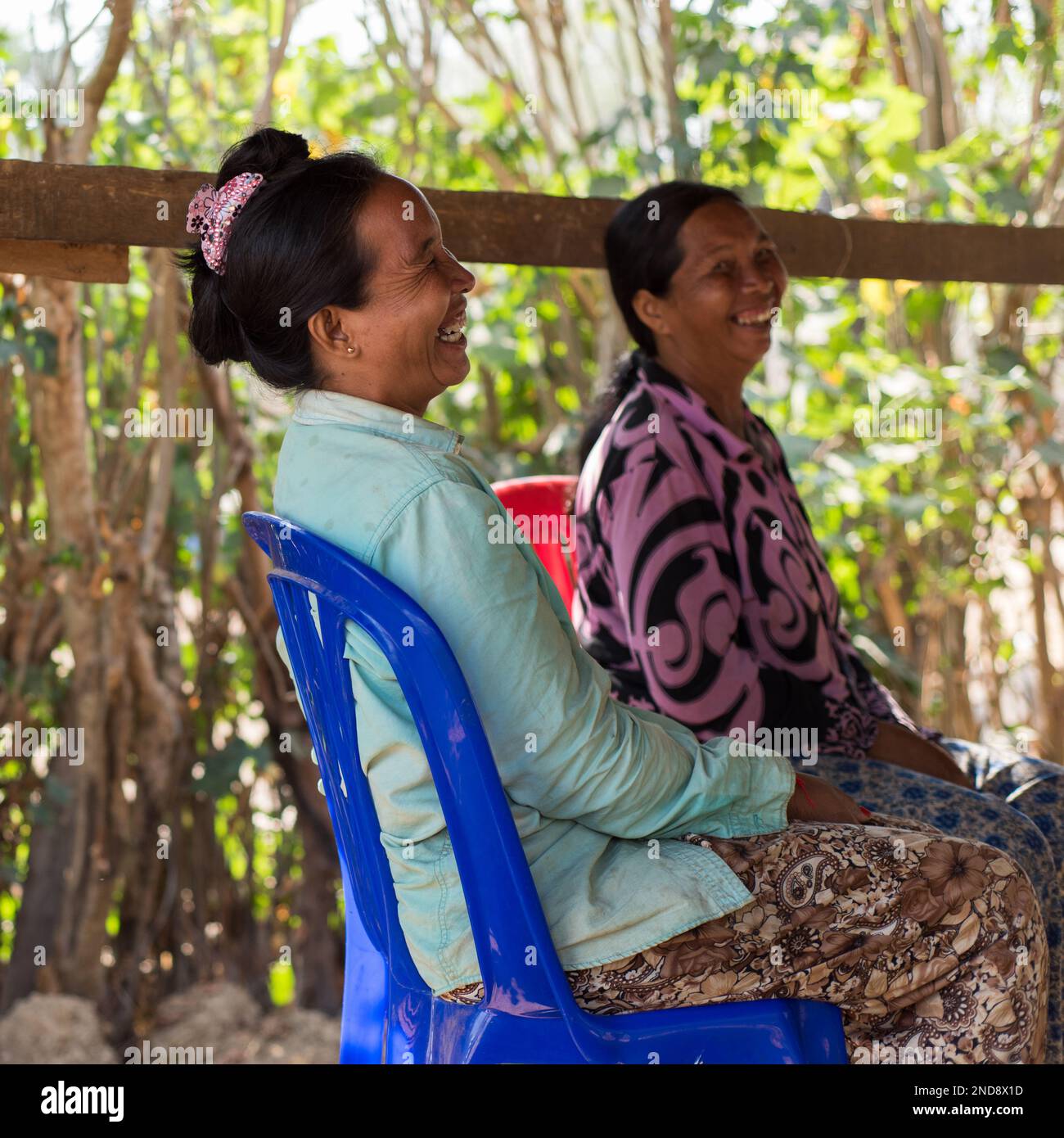 Community members laughing and sharing a joke during the CHAD ...