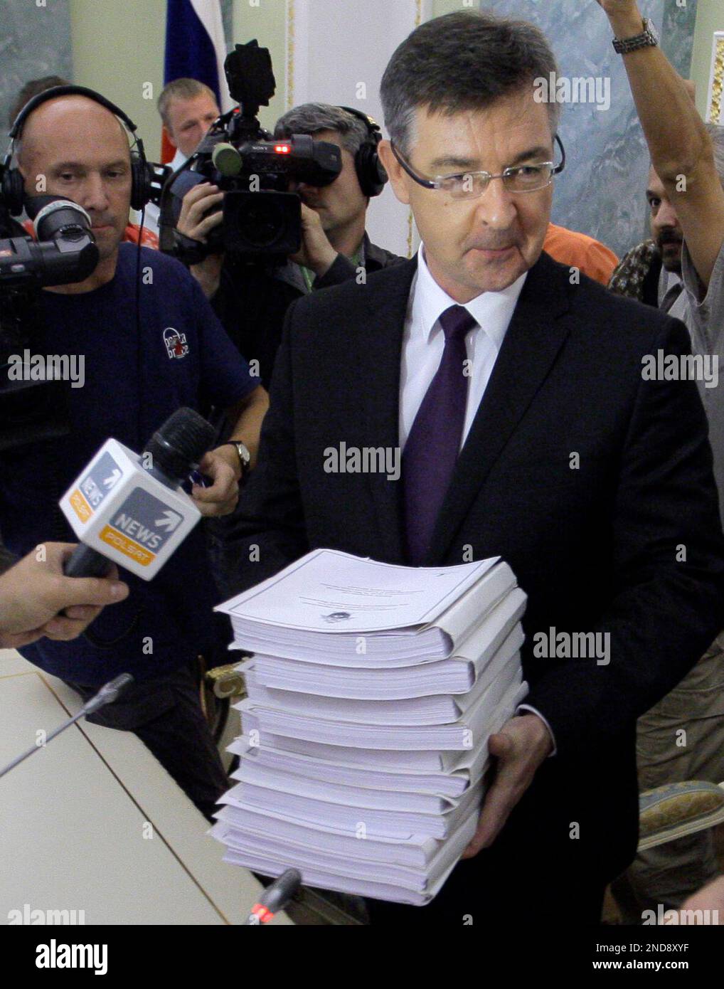 Polish Gen. Krzysztof Parulski holds documents relating to the plane ...
