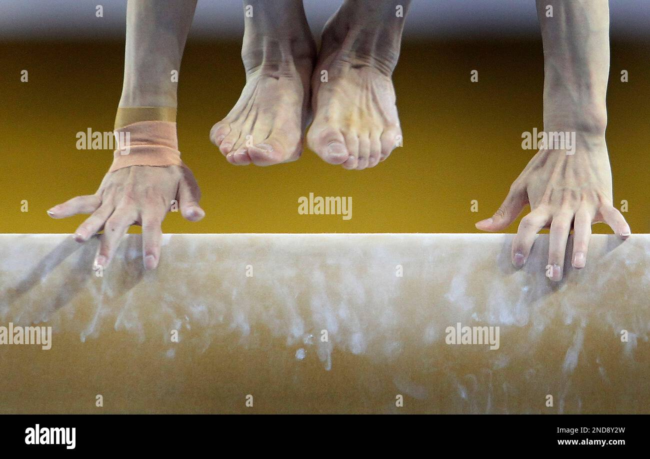 Tan Sixin of China competes in the Beam event during the Artistic ...