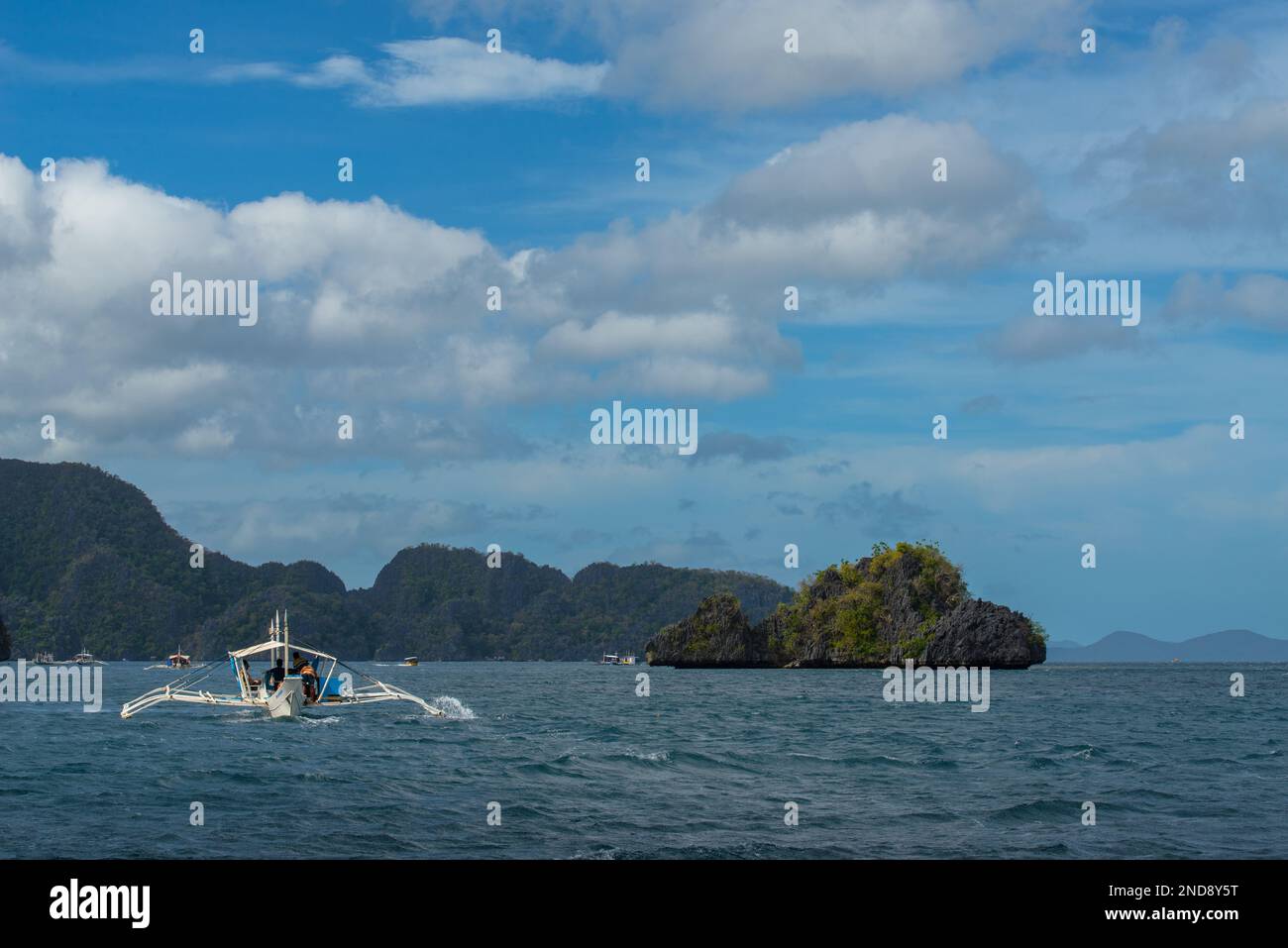 This photo captures the essence of the Philippines, with a traditional ...
