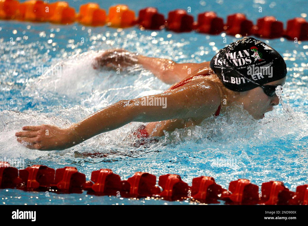 Lara Butler of Cayman Islands competes in the women's 100-meter ...