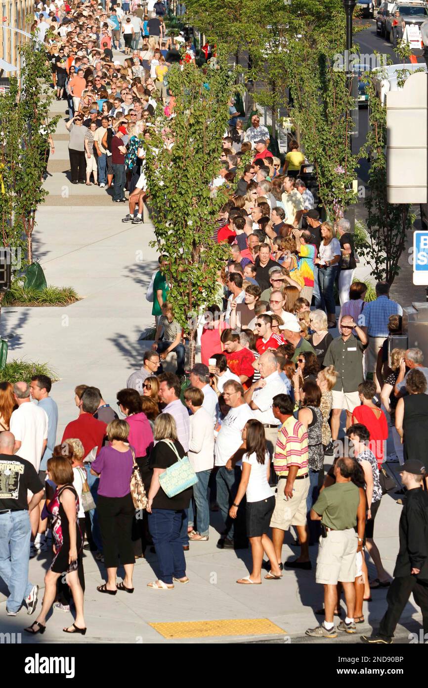 Fans line up outside the new CONSOL Energy Center for the concert by ...