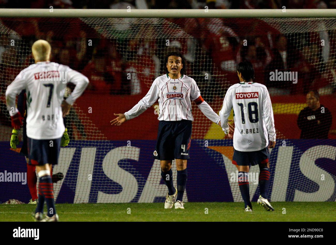 Mexico's Chivas' Hector Reynoso, center, reacts after Brazil's SC ...