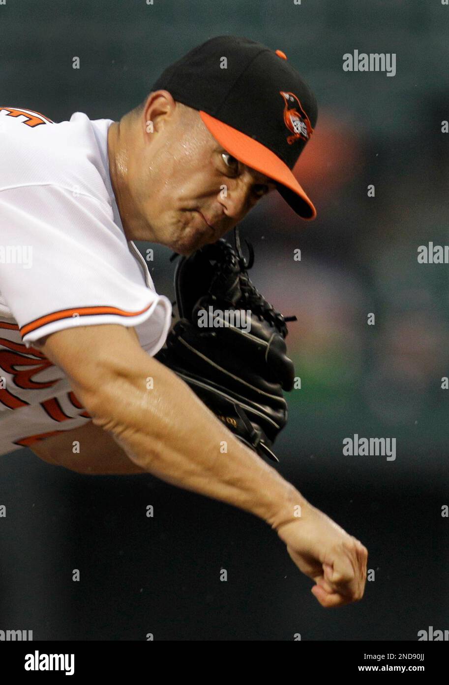Baltimore Orioles starting pitcher Jeremy Guthrie delivers to a Seattle ...