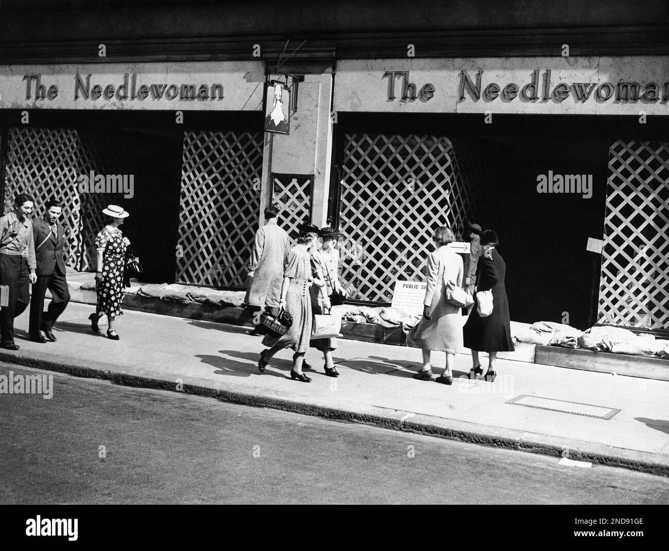 Shopping in some parts of London calls for peering through taped ...