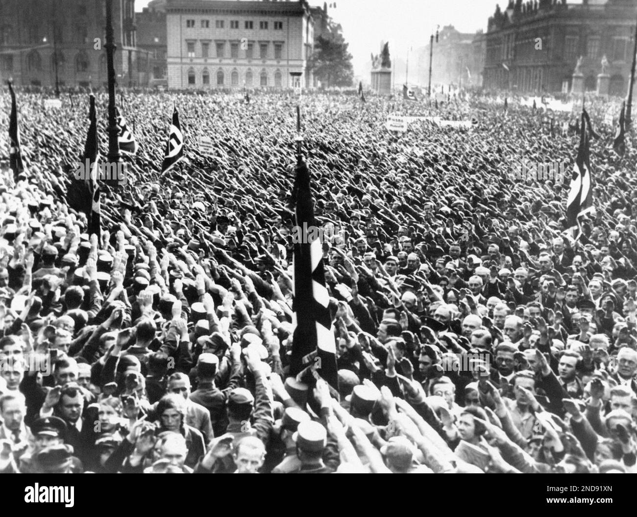 Thousands of hands raised giving the Nazi salutes, these residents of ...