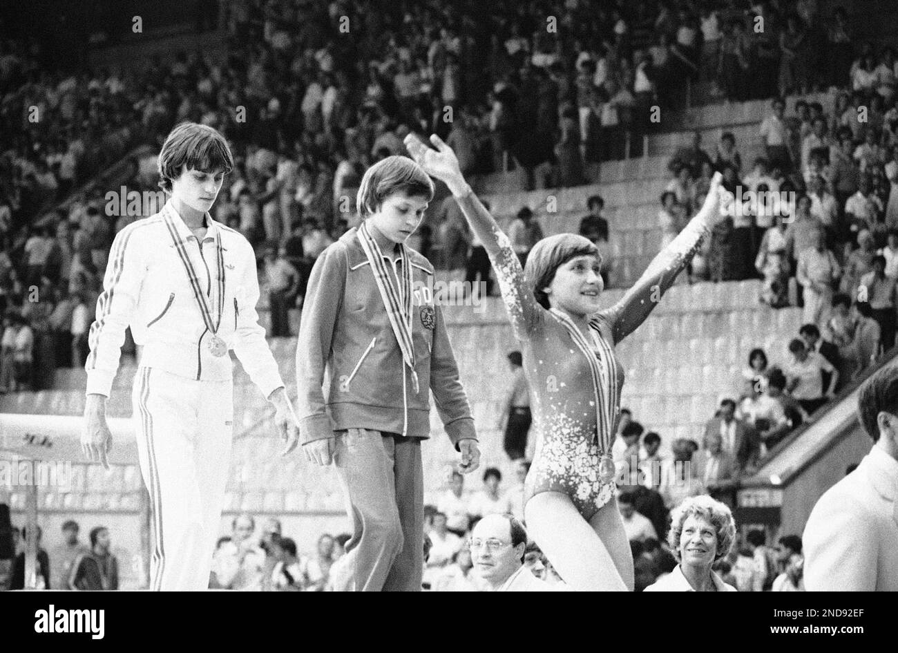 Soviet Yelena Davydova, right, greets cheers after receiving gold medal ...