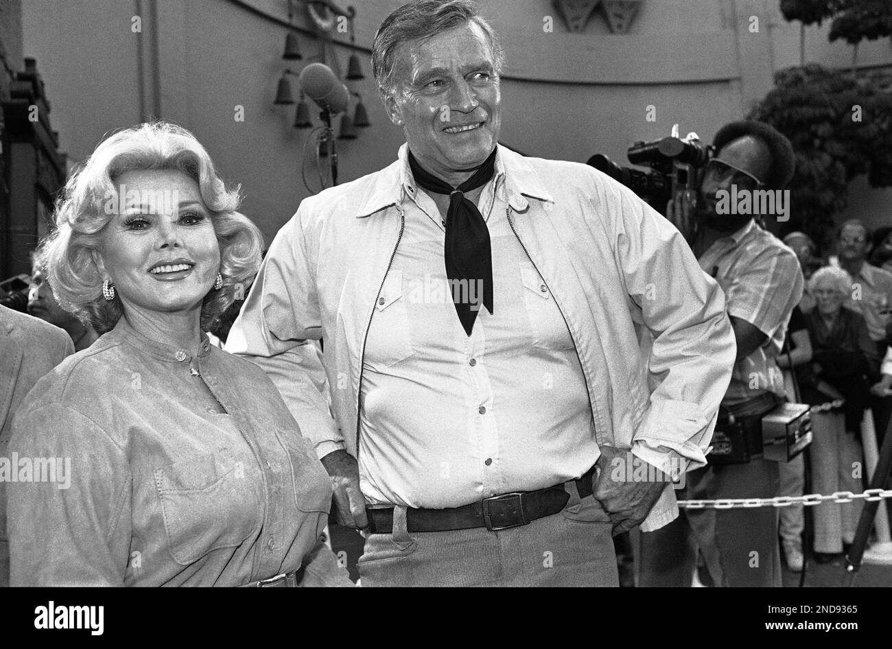 Celebrity Zsa Zsa Gabor, left, and Actor Charlton Heston stop briefly ...