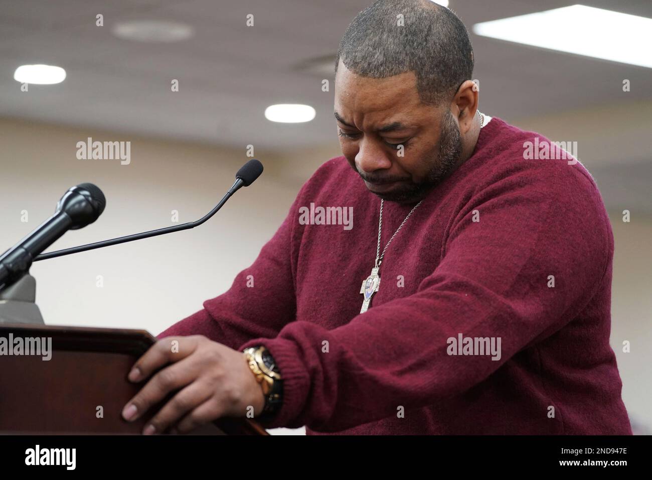 Wayne Jones, the son of Tops shooting victim Celestine Chaney, pauses ...