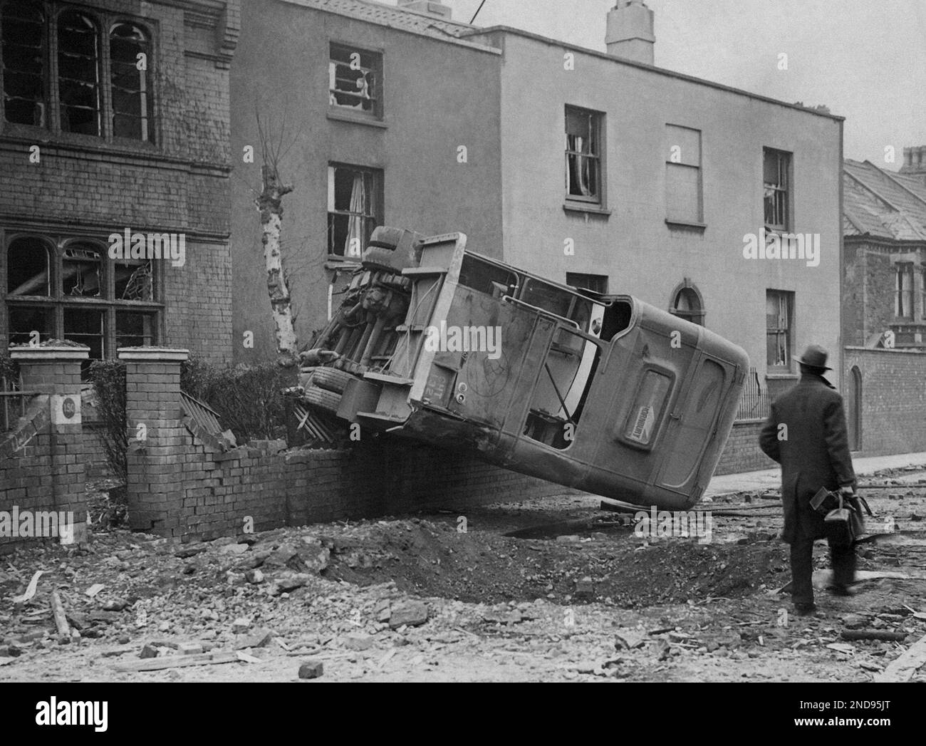 A double-decker bus was blown into the front garden of this Bristol ...