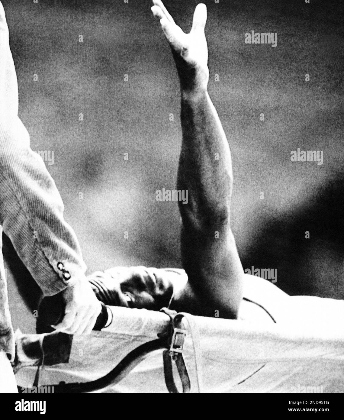 Cuba's Jorge Roche waves to the crowd as he's carried from Olympic ...