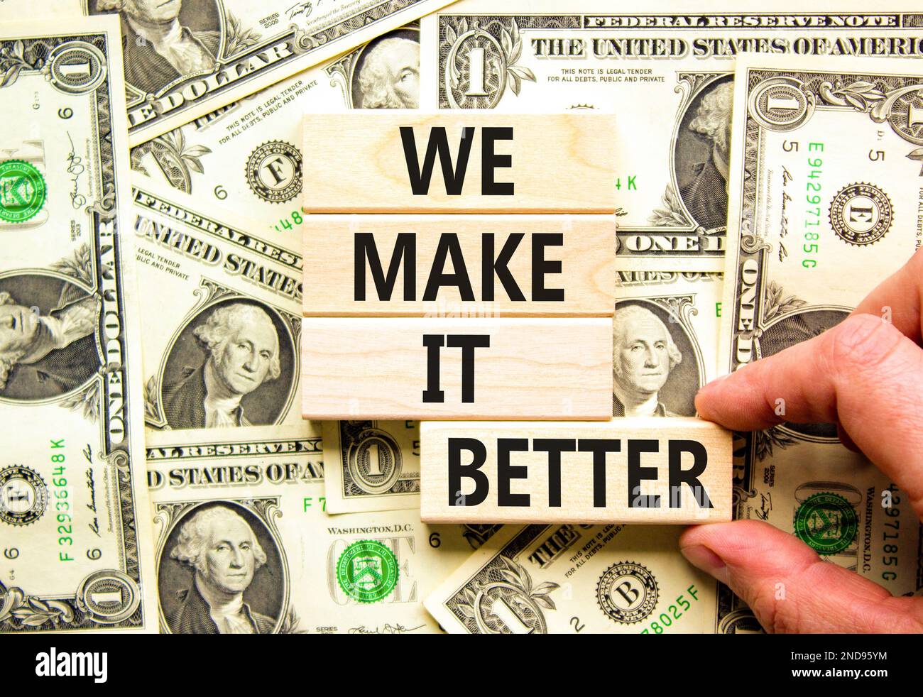 We make it better symbol. Concept words We make it better on wooden ...