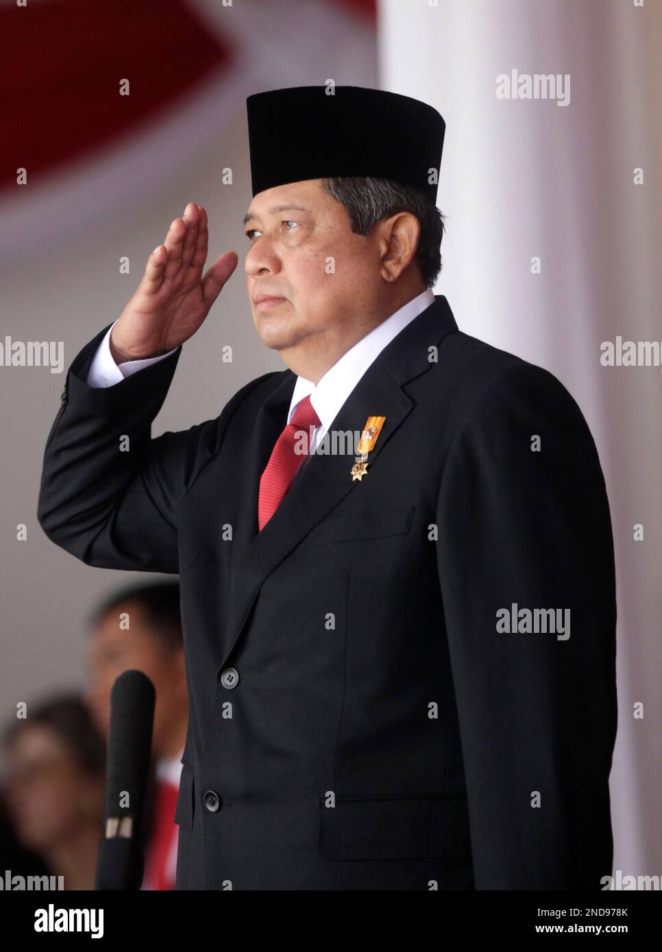 Indonesian President Susilo Bambang Yudhoyono salutes during a flag ...
