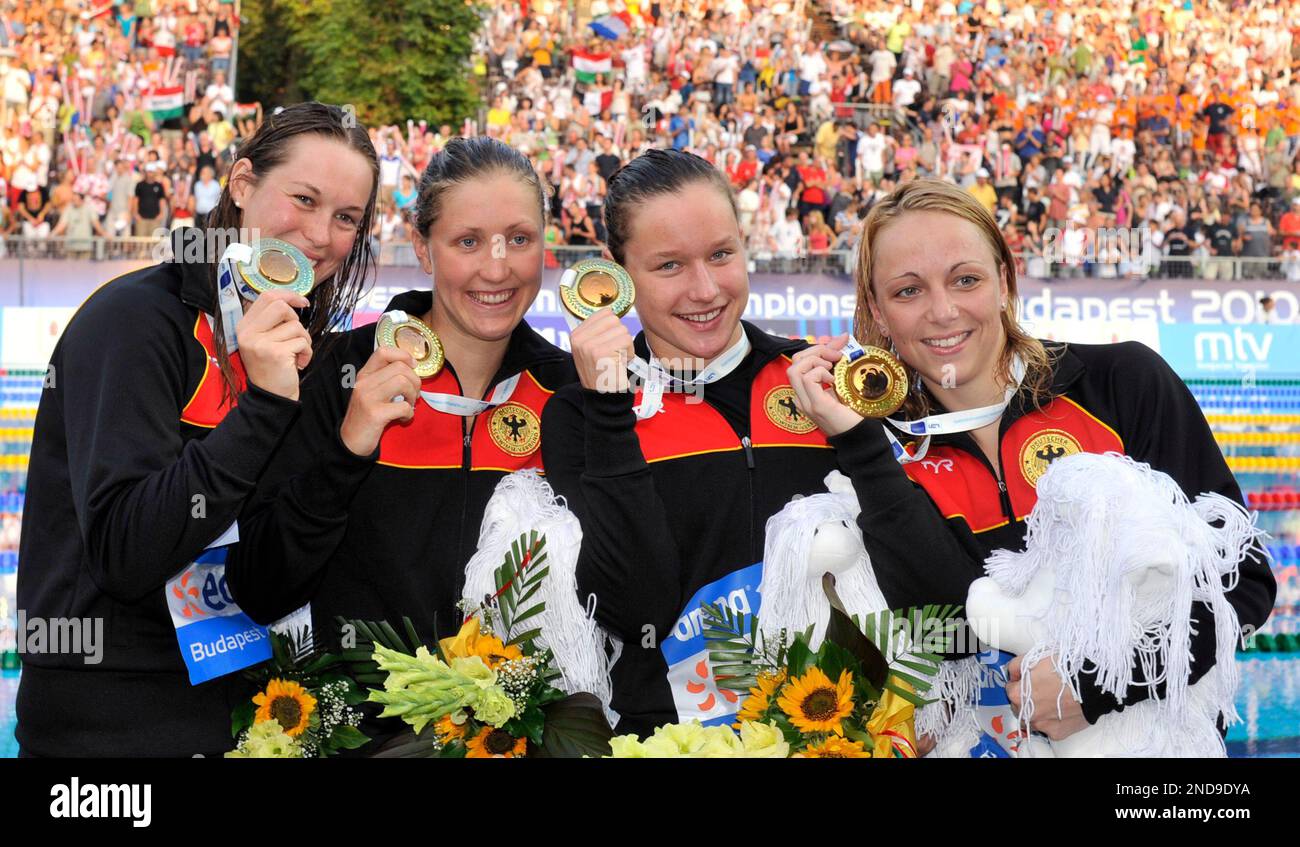 Germany's bronze medal winning team show off their medals after the ...