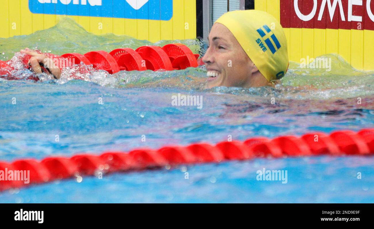 Sweden's Therese Alshammar celebrates winning the gold medal in the ...