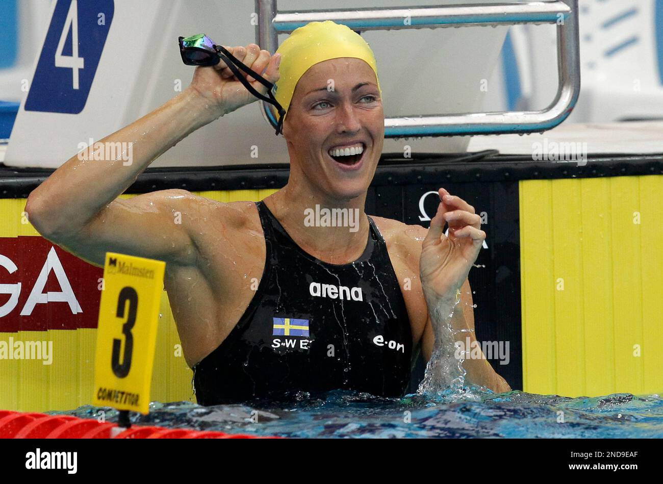 Sweden's Therese Alshammar celebrates winning the gold medal after the ...