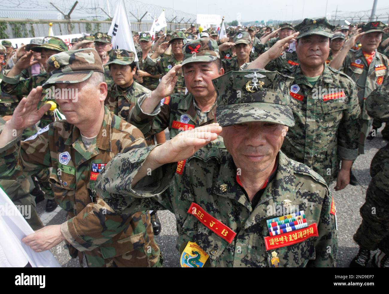South Korean Vietnam War veterans salute during a rally against North ...