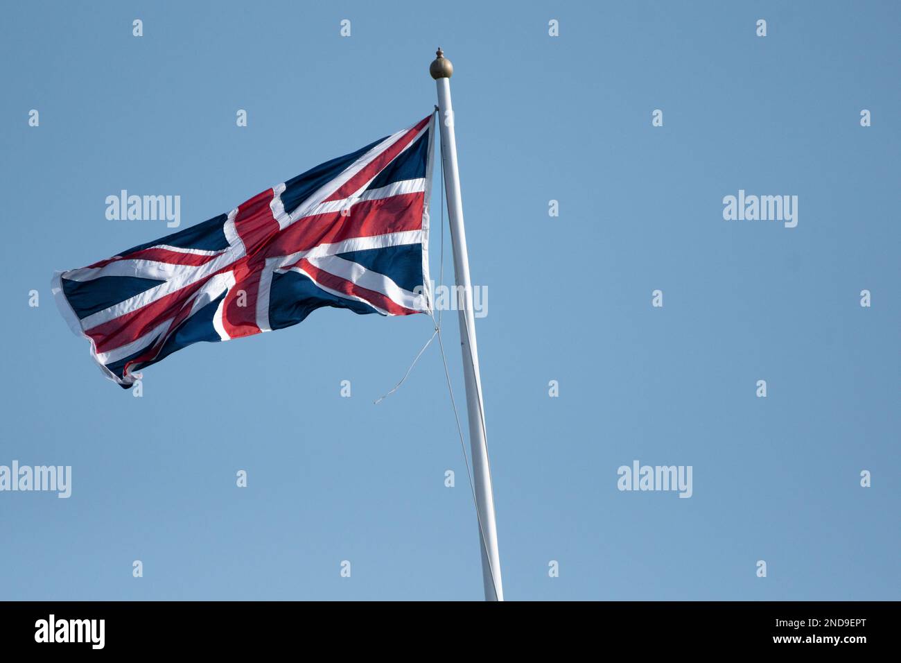 The Union Flag flying from a flagpole in Newquay in Cornwall in the UK ...