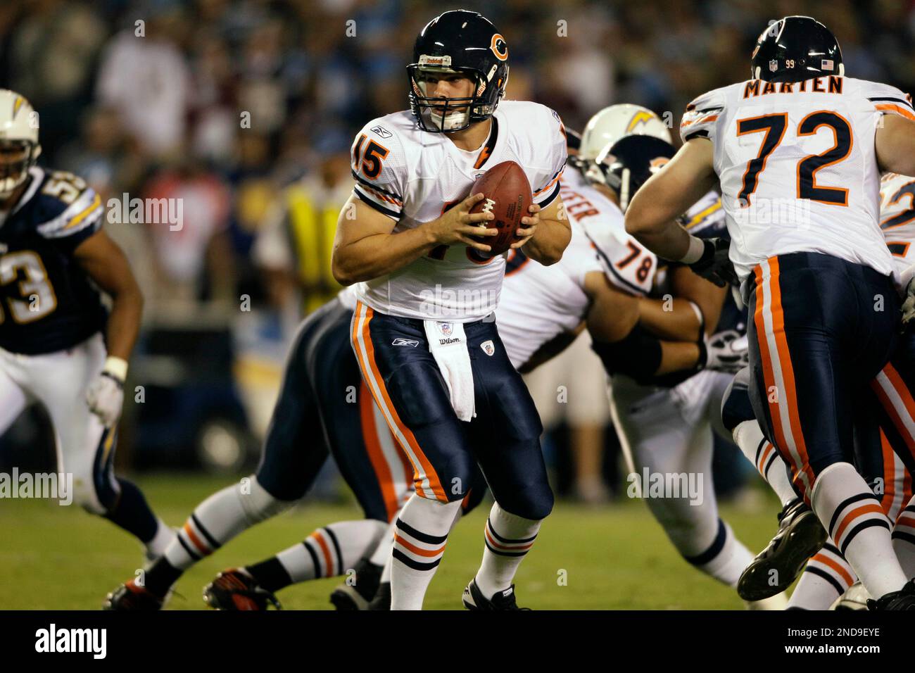 Chicago Bears quarterback Dan LeFevour looks back to hand off while ...