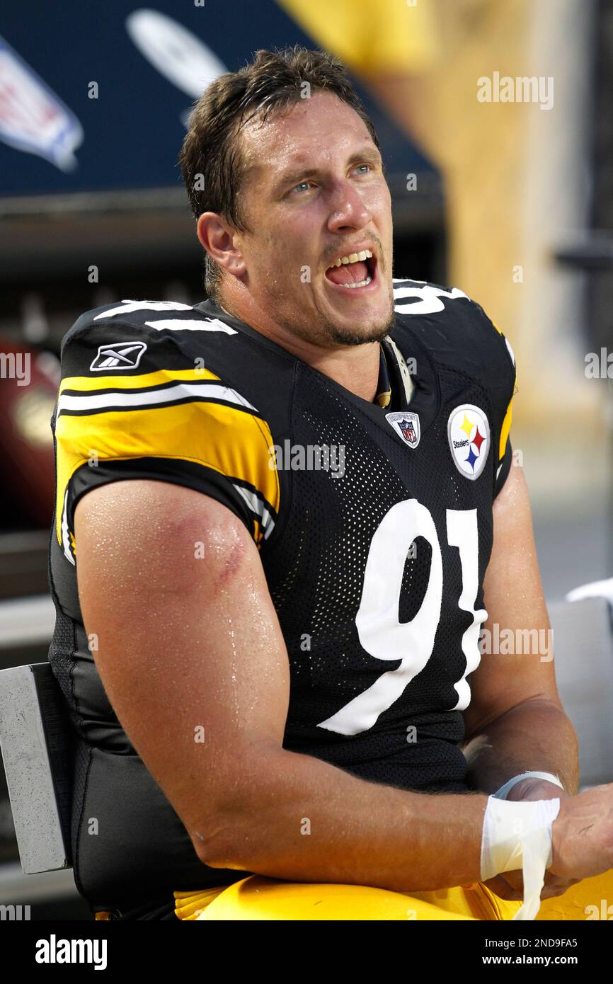 Pittsburgh Steelers defensive end Aaron Smith sits on the sidelines ...