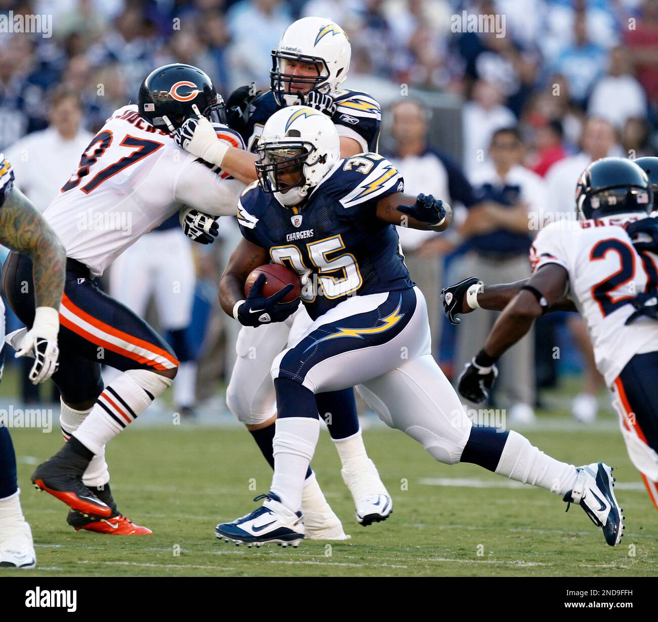 San Diego Chargers' Mike Tolbert runs against the Chicago Bears during ...