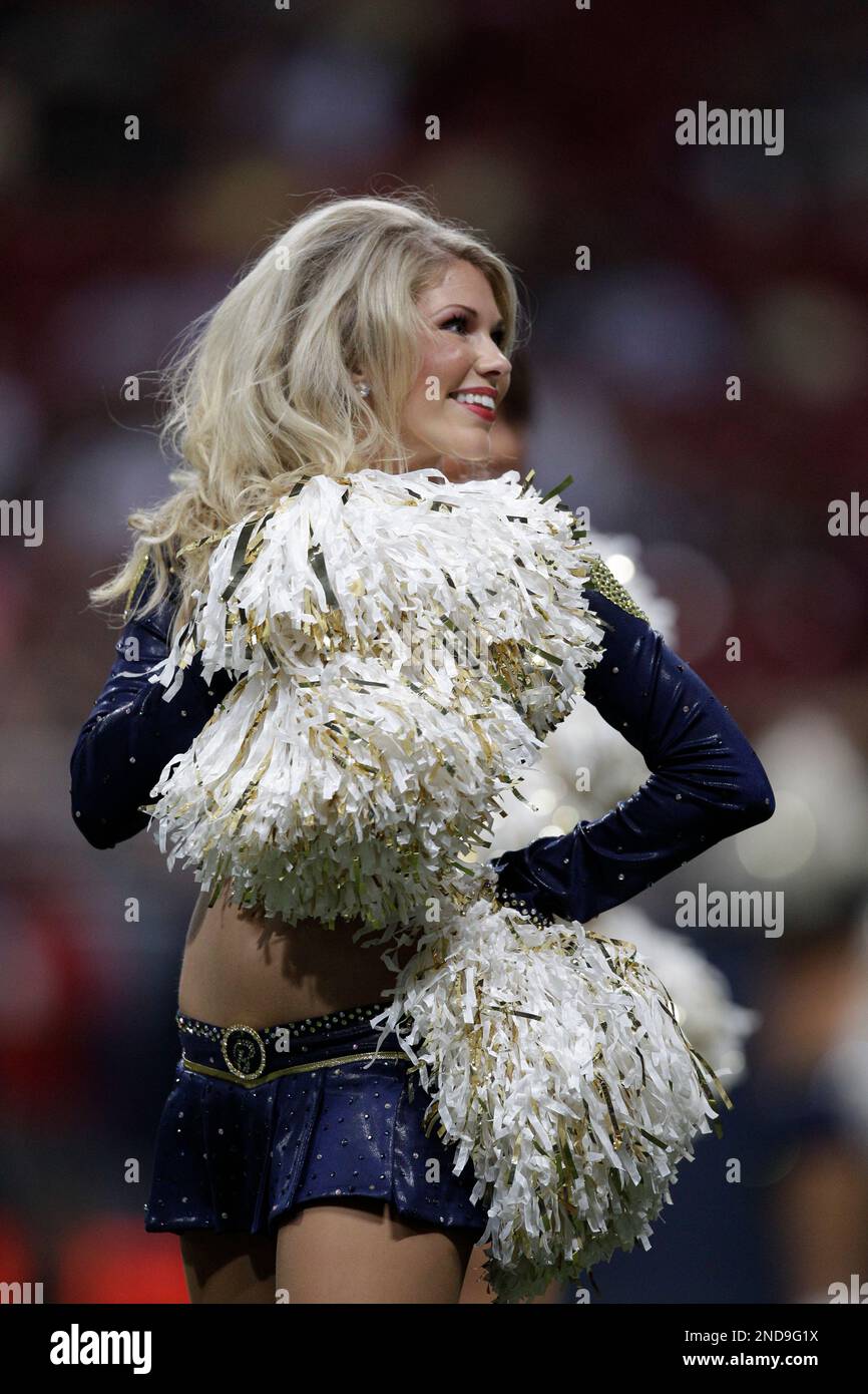 A St. Louis Rams cheerleader performs during the second quarter of a ...