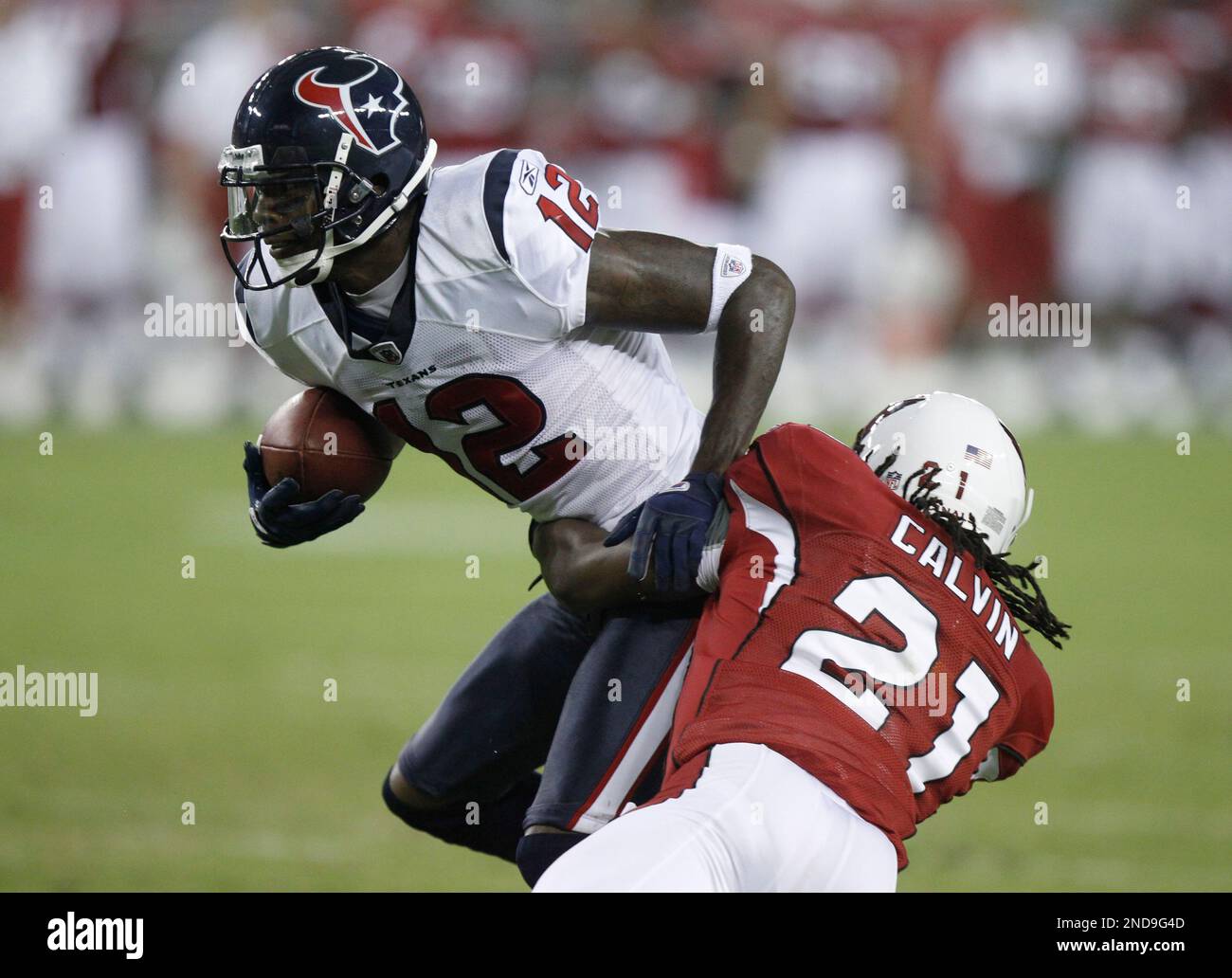 Houston Texans' Jacoby Jones (12) makes a catch as Arizona Cardinals ...