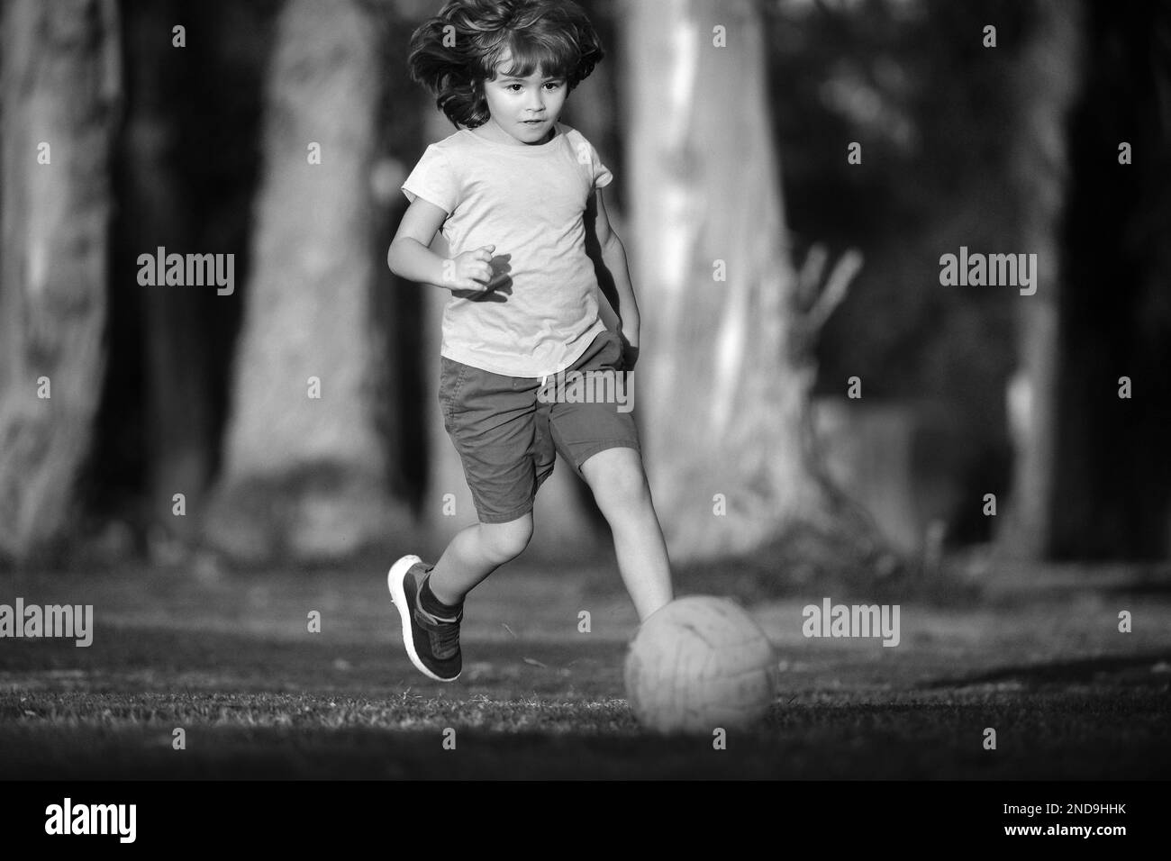Little Black Kids Playing Football