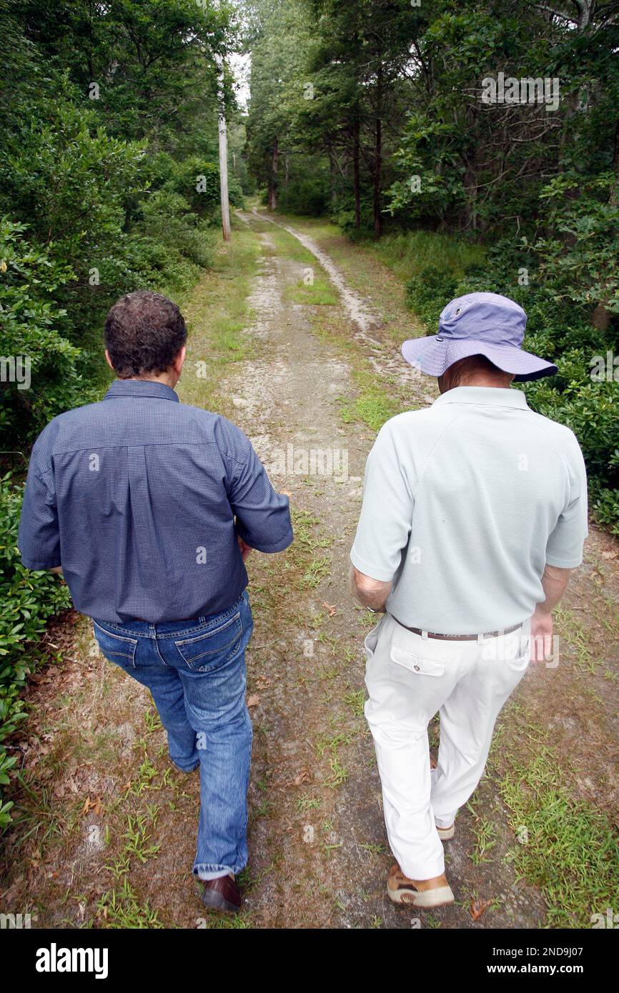 John Browning, right, head of the Waltham Land Trust walks with Rev ...