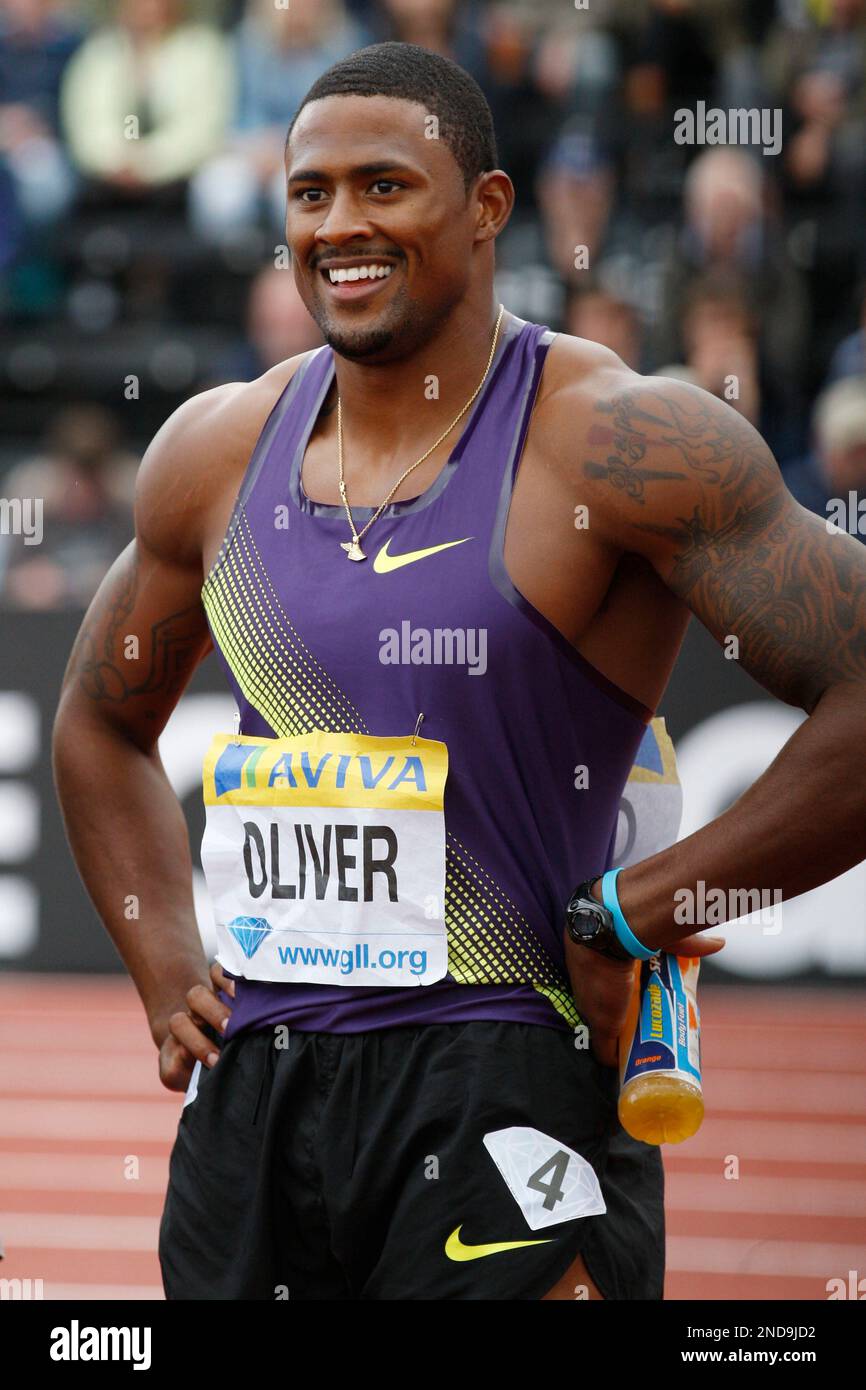 David Oliver of U.S.A. reacts to his win in the men 110m hurdles final ...