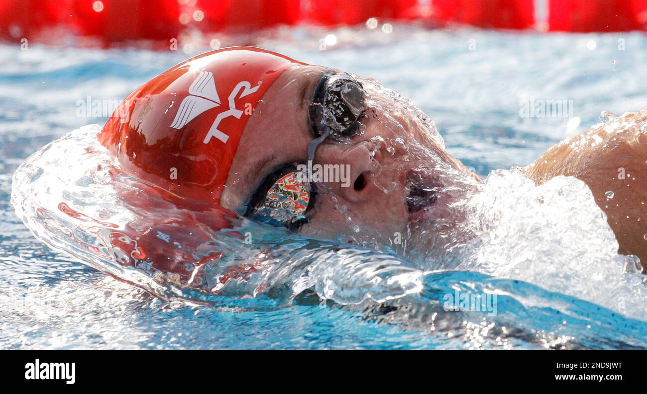 Denmark's Lotte Friis swims to win the gold medal in the Women's 1500m ...