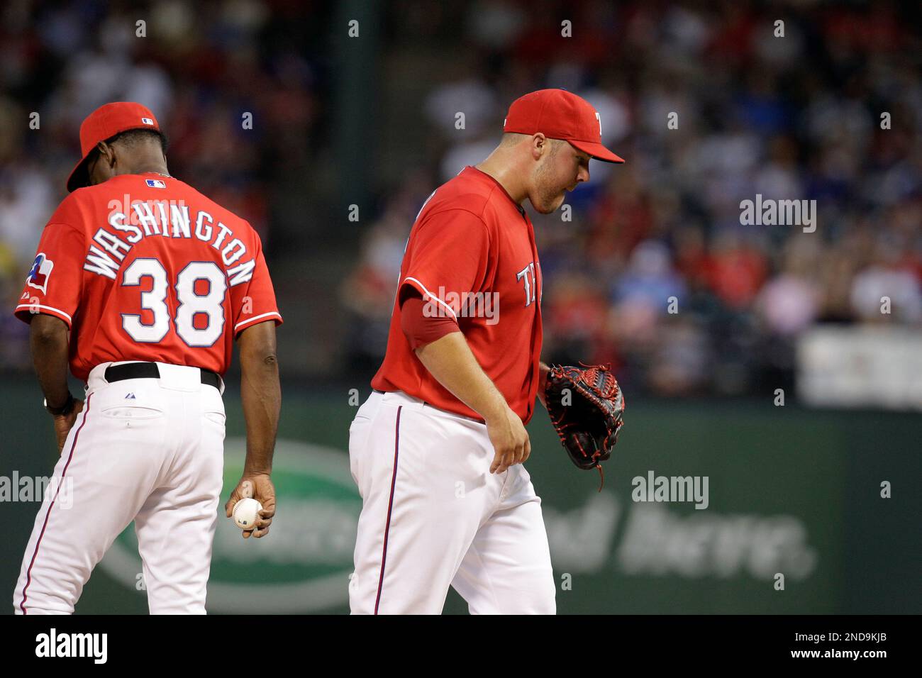 Texas Rangers manager Ron Washington (38) and starting pitcher Tommy ...