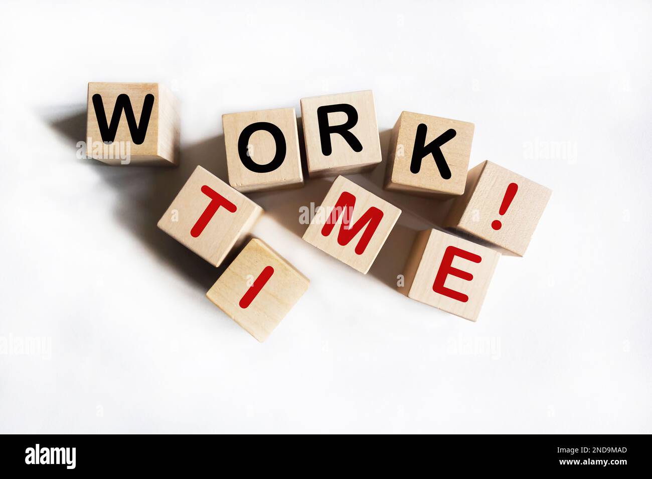 Work Time text on wooden blocks lying on a white background. Business ...
