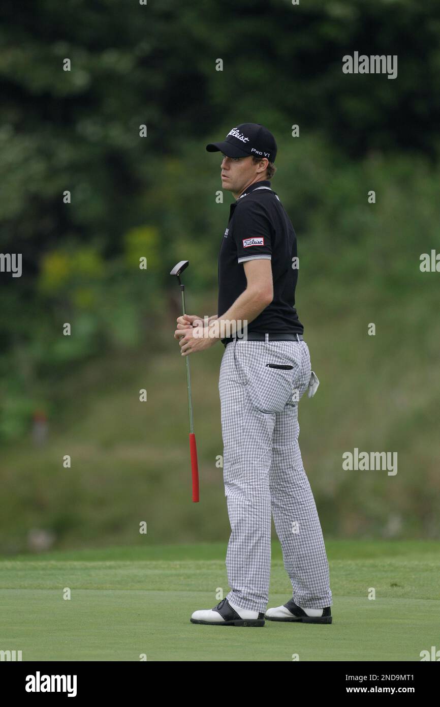 Nick Watney watches a putt during the second round of the PGA ...