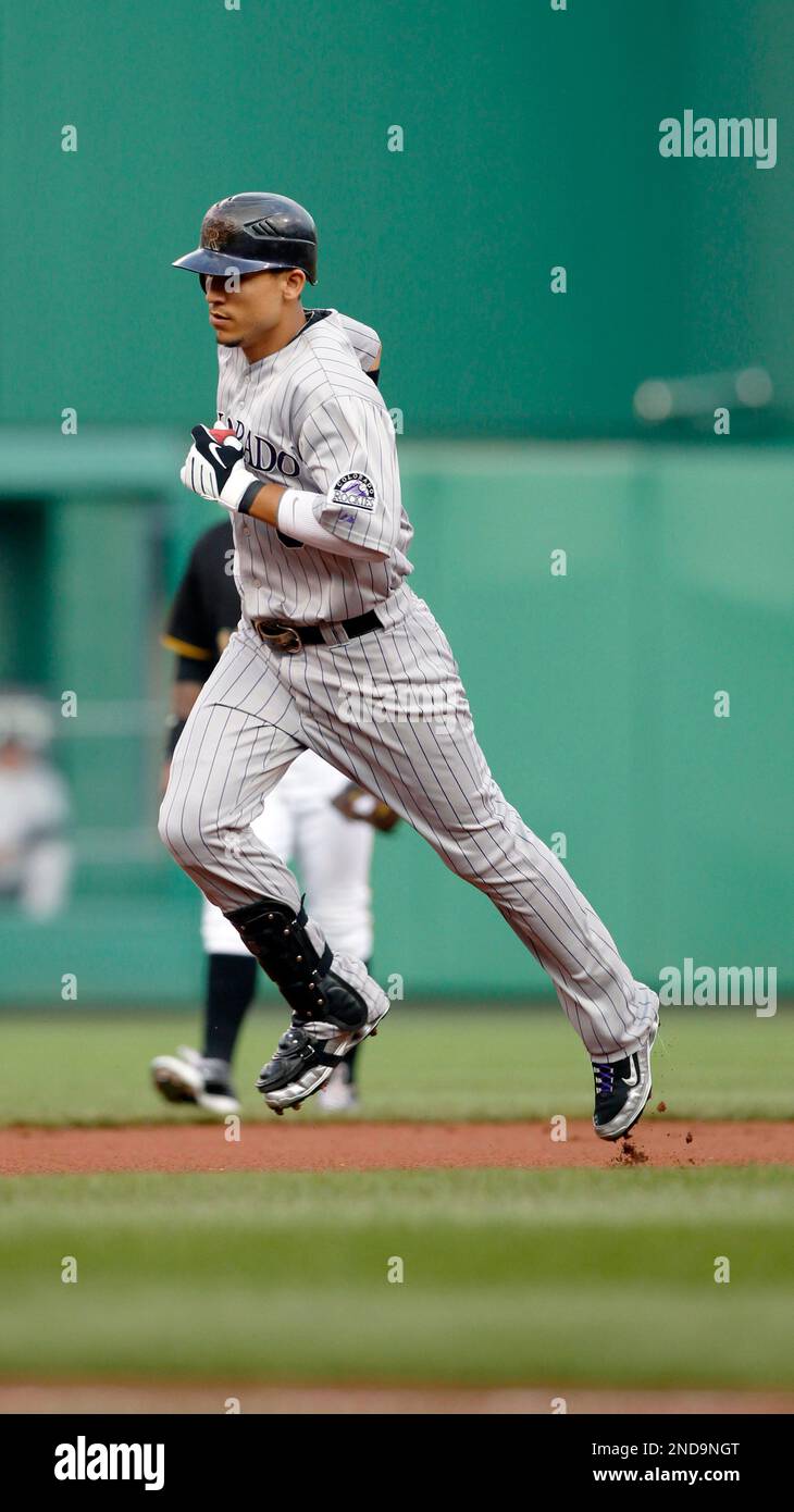 Colorado Rockies' Carlos Gonzalez (5) plays in the baseball game ...