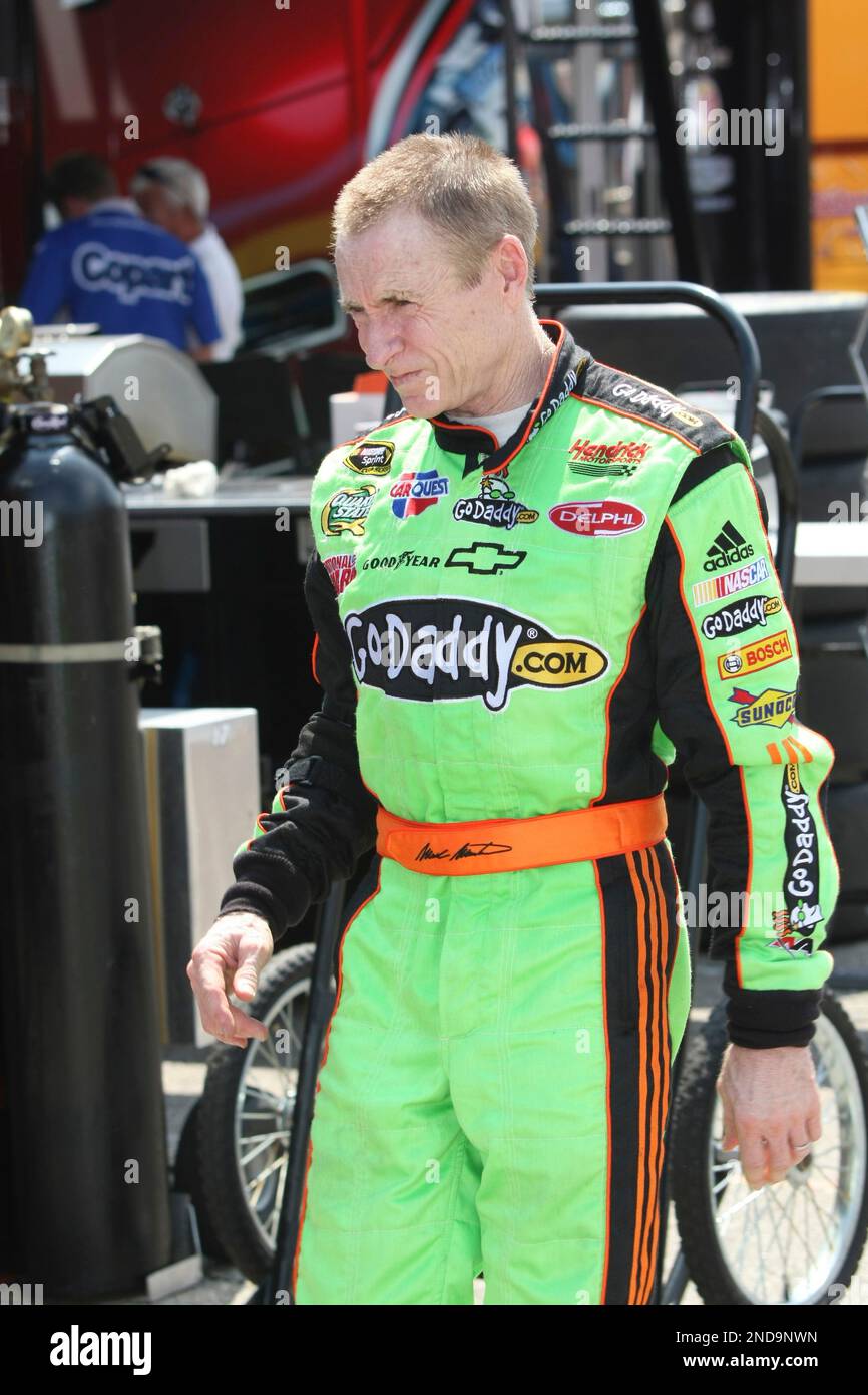NASCAR driver Mark Martin walks in the garage area at Michigan ...