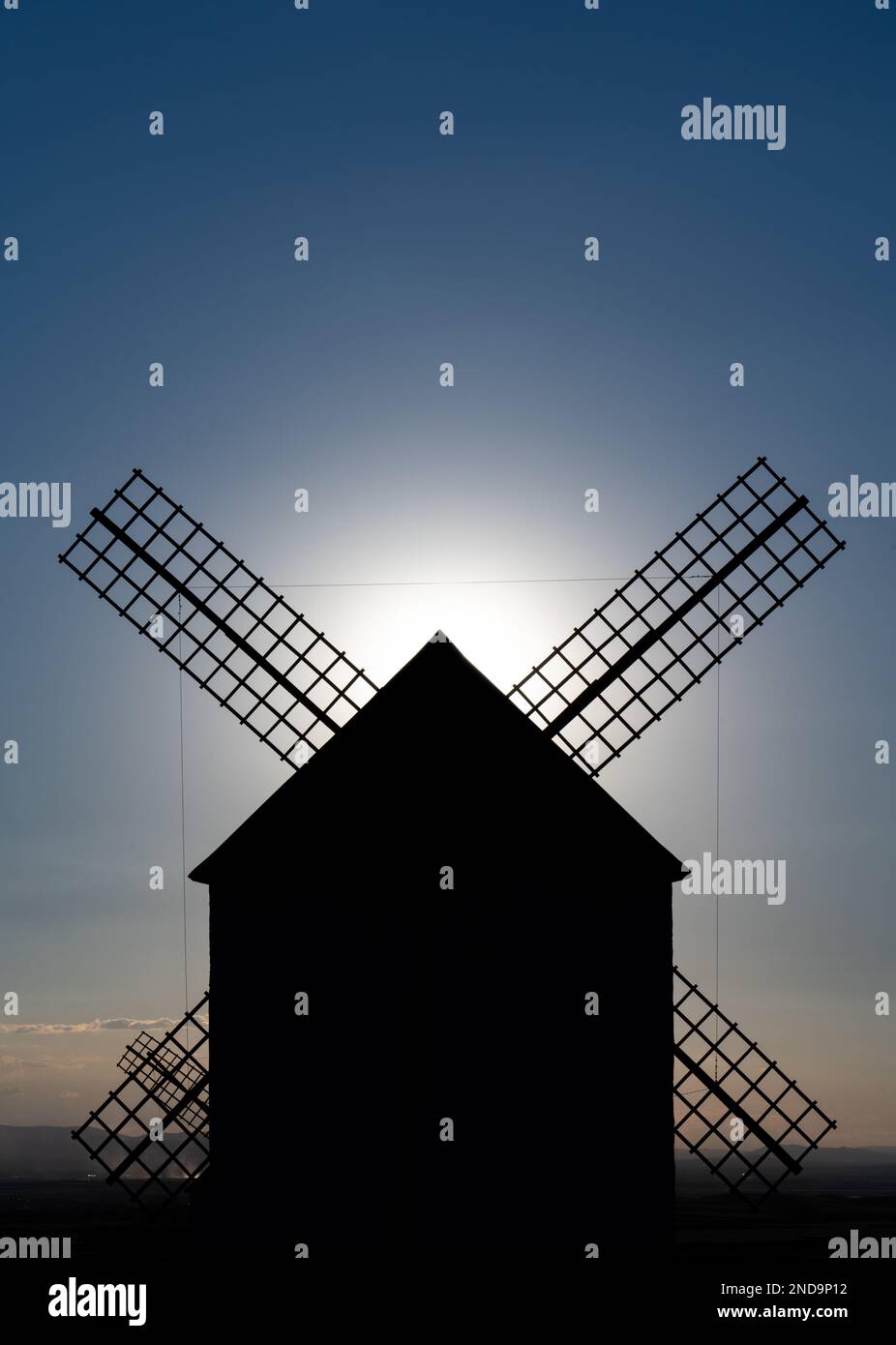 Antique vintage windmill silhouette against the sunset Stock Photo - Alamy