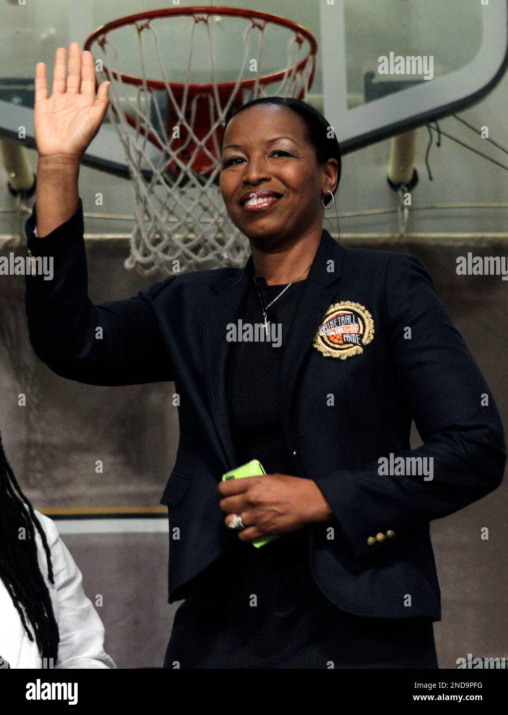 Basketball Hall of Fame inductee Cynthia Cooper waves as she is ...