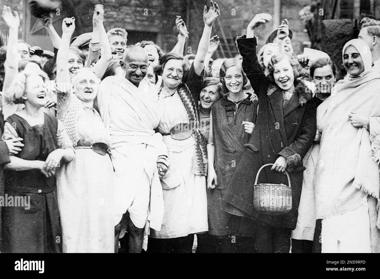 Mahatma Gandhi, leader of Indian Nationalist Party, is cheer by women ...
