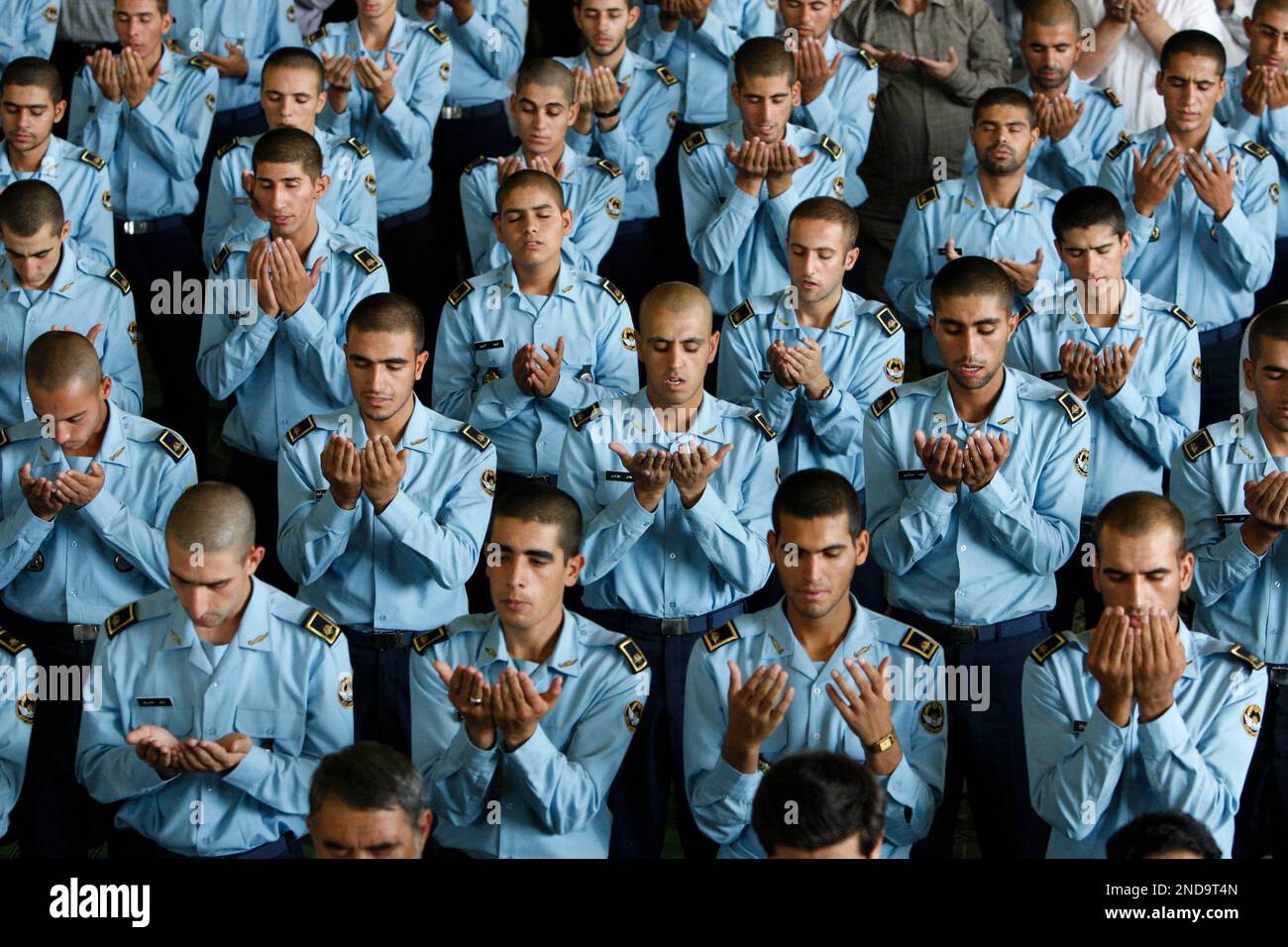 Iran's army air force cadets perform Friday prayers on the Muslims ...