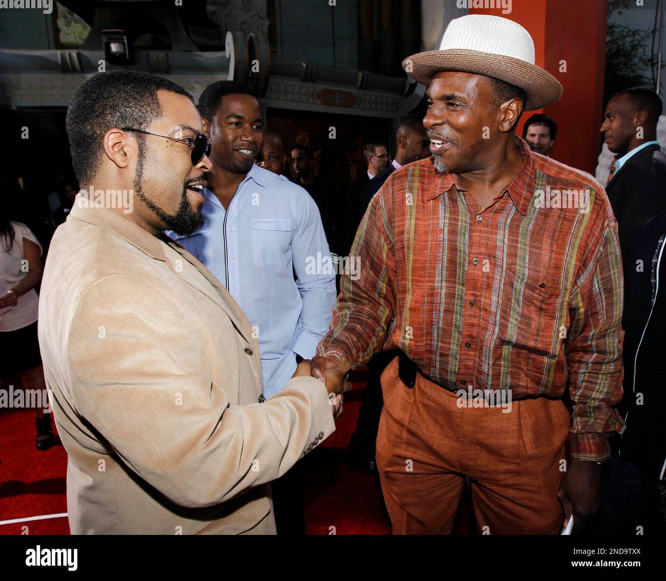 Cast member Ice Cube, left, and Keith David, right greet each other as ...