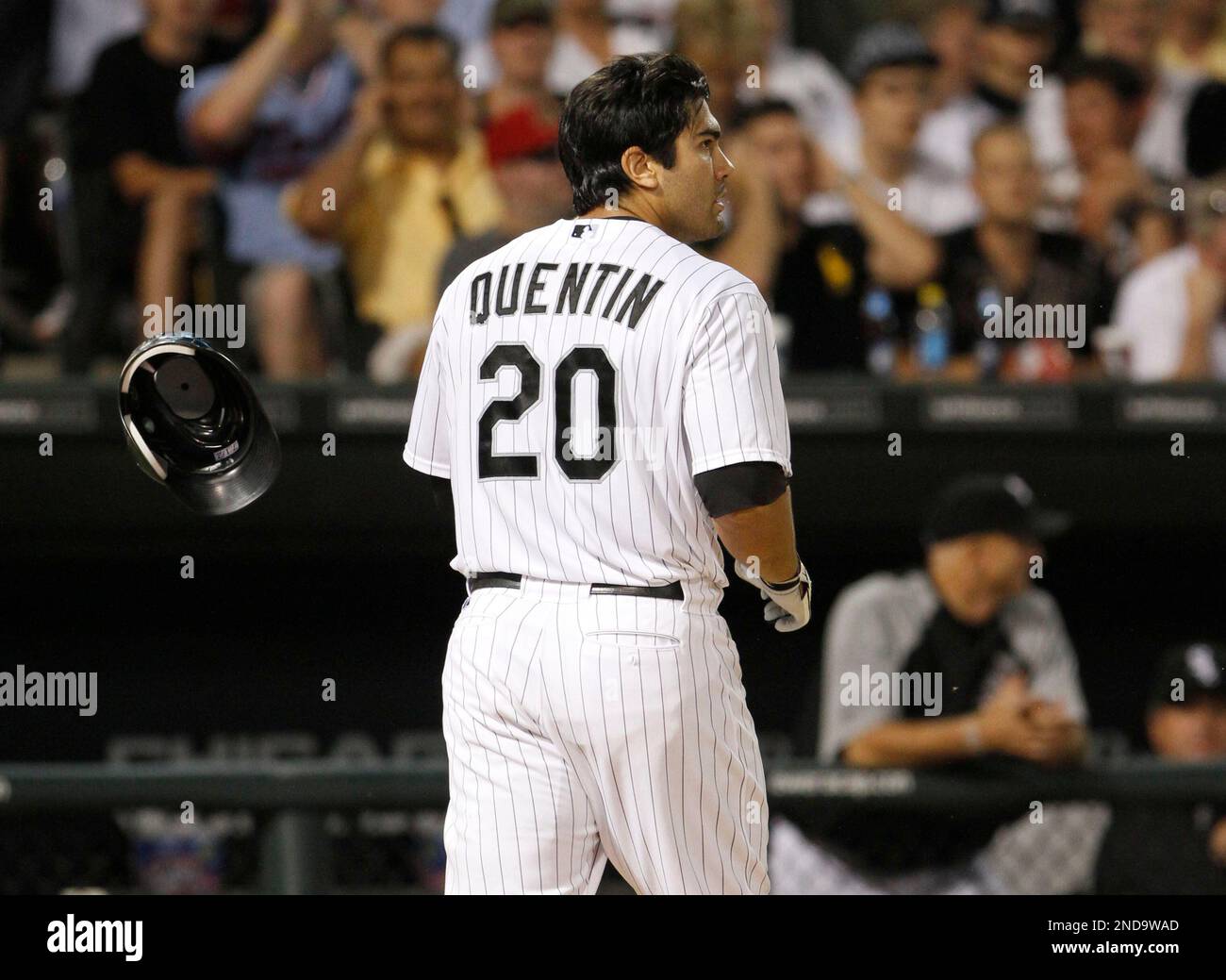 Chicago White Sox' Carlos Quentin tosses his helmet after striking out ...