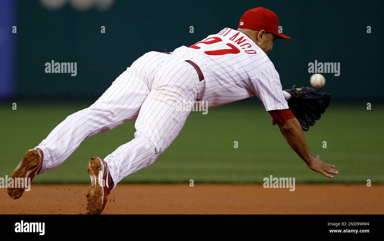 Philadelphia Phillies third baseman Placido Polanco tries to reach an ...