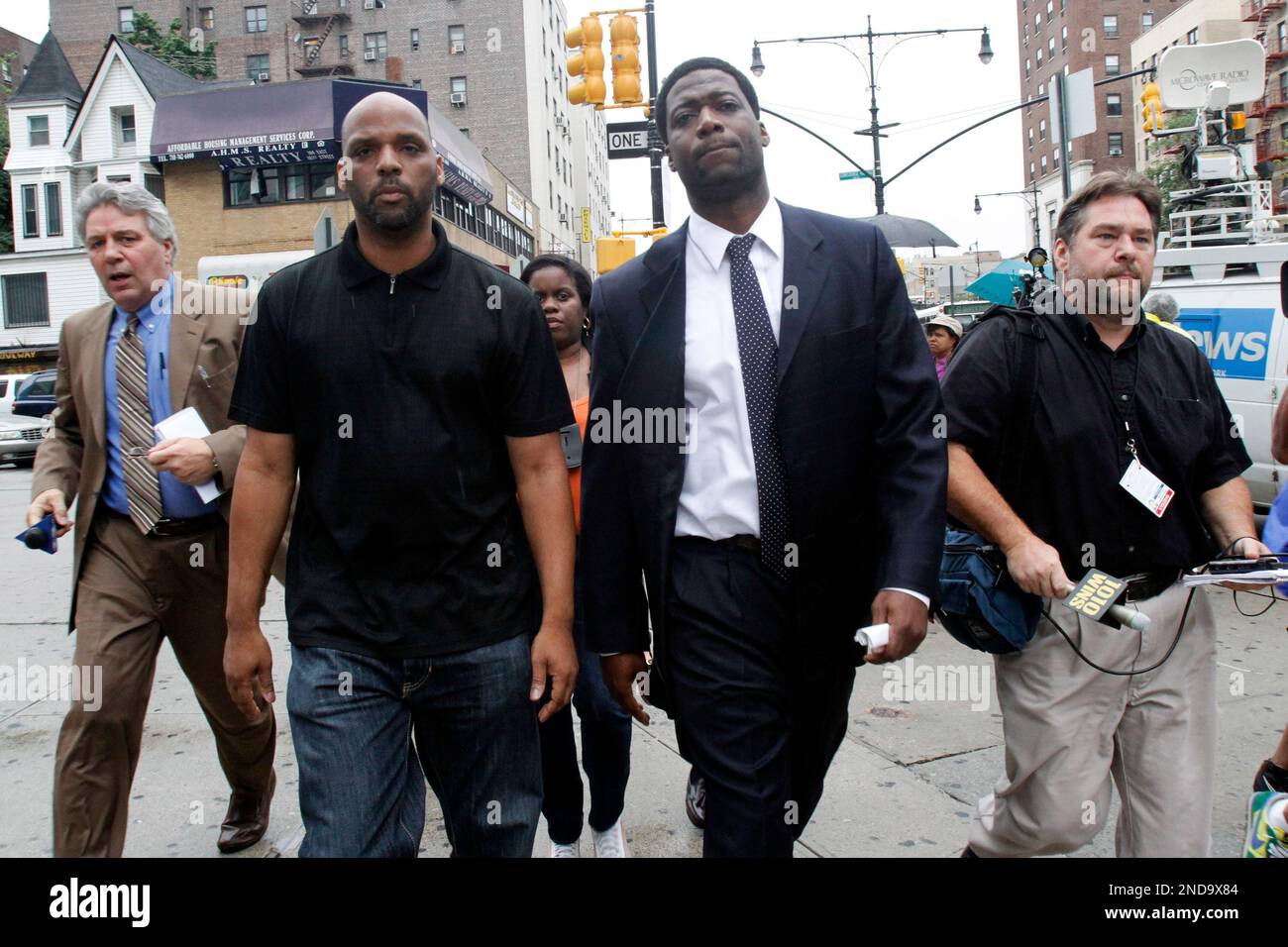 David Johnson, second from right, leaves Bronx Criminal court after his ...