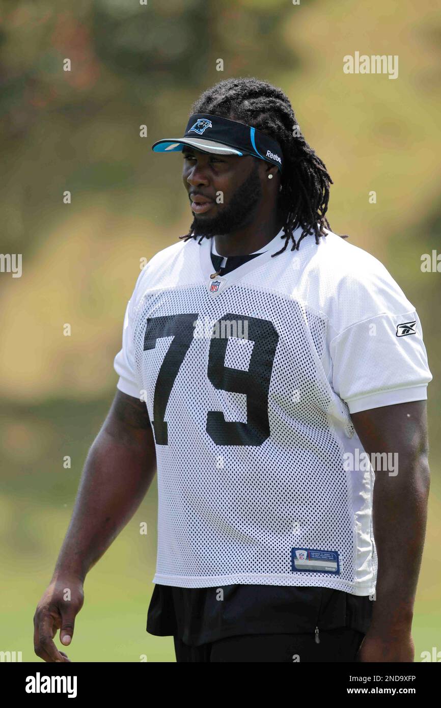 Carolina Panthers' Jeff Otah walks onto the field during practice at ...