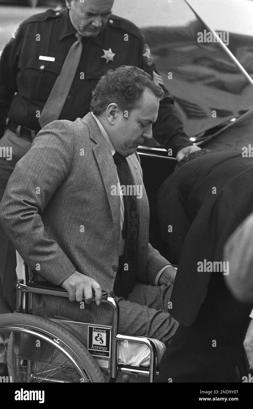 Hustler magazine publisher Larry Flynt settles into his wheelchair as ...