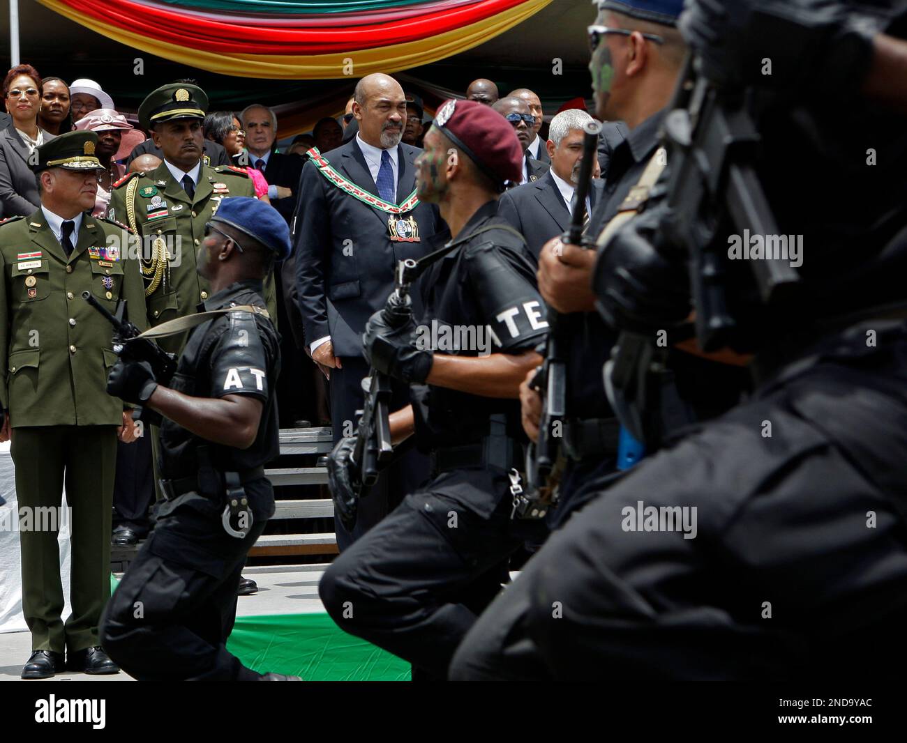 Suriname's President Desi Bouterse, third from left, attends a military ...