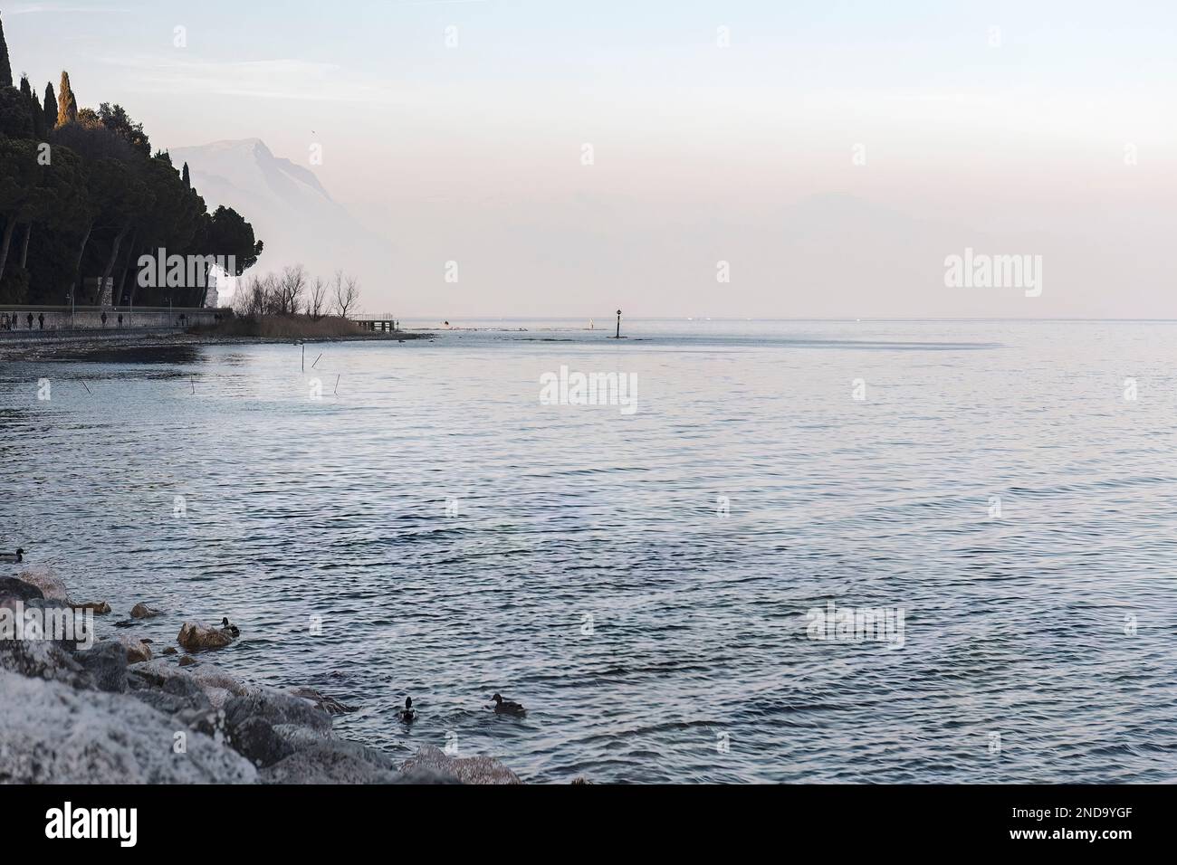 A breathtaking view of the picturesque shoreline of Lake Garda ...